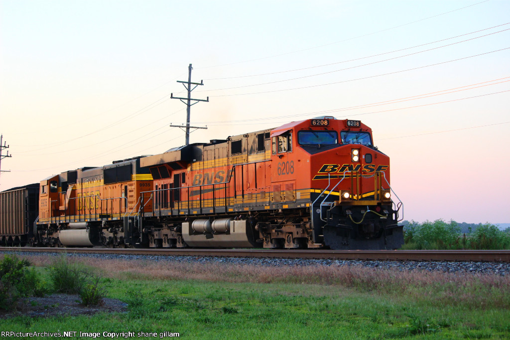 BNSF 6208 leads a loaded ucex coal out of elsberry mo.